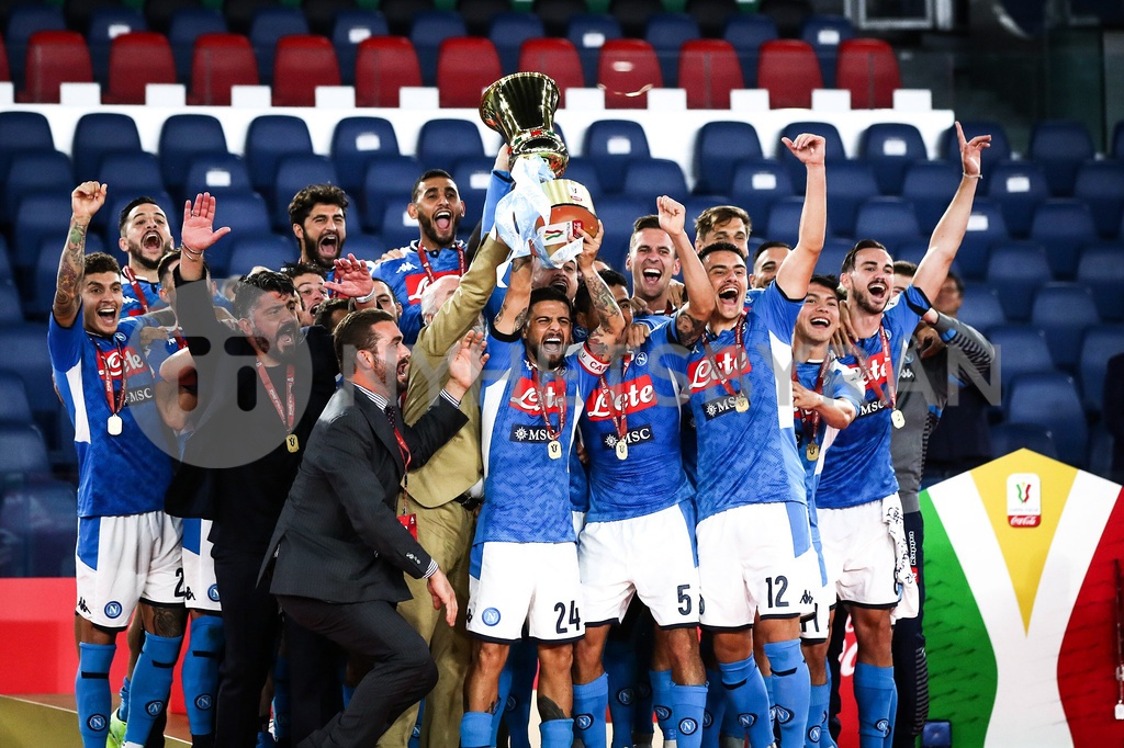 Players of Napoli celebrate with the italian cup trophy during the Coca ...