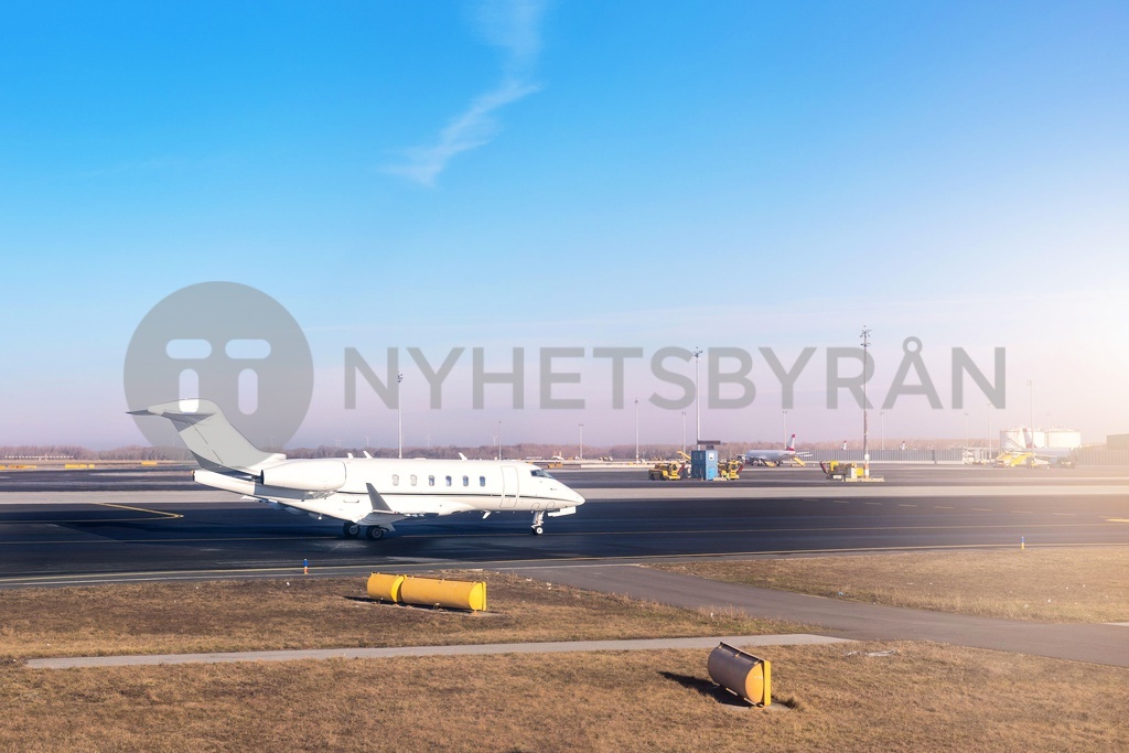 Mid size modern vip private jet running on rairport runway ready to ...