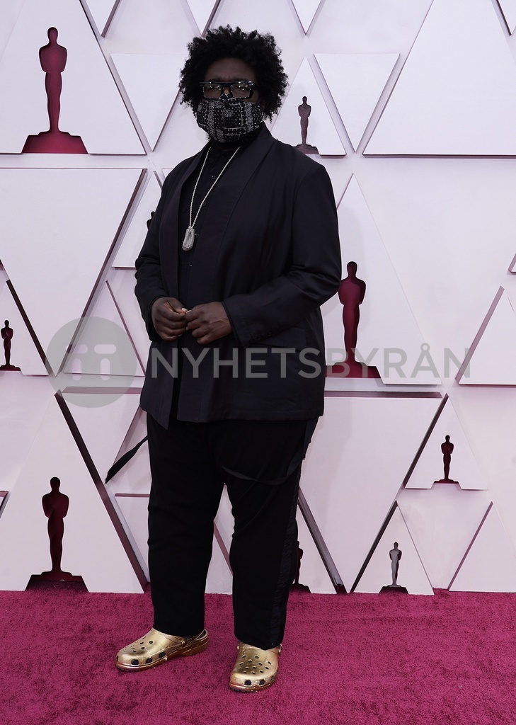Martin Desmond Roe arrives at the Oscars on Sunday, April 25, 2021, at ...