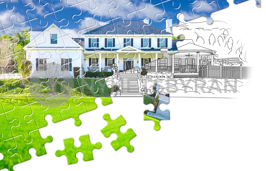 Puzzle Pieces Fitting Together Revealing Finished House Build Over Drawing.