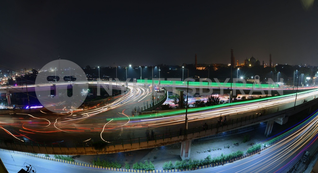 Stunning view of buildings illuminated with colorful lights to ...